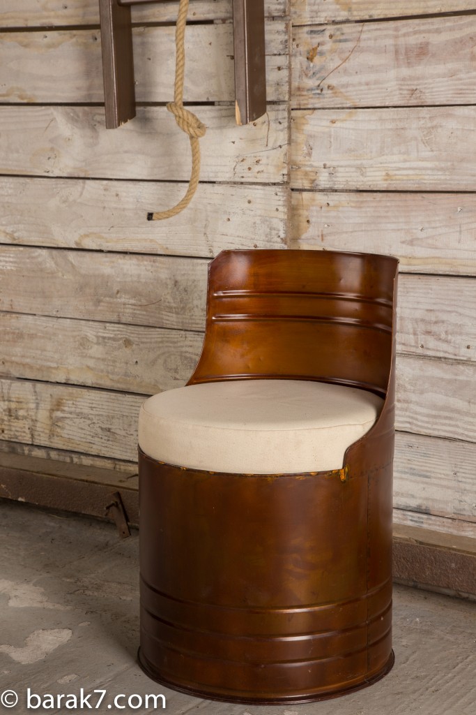Bronze finish drum chair - The Art of Design Magazine
